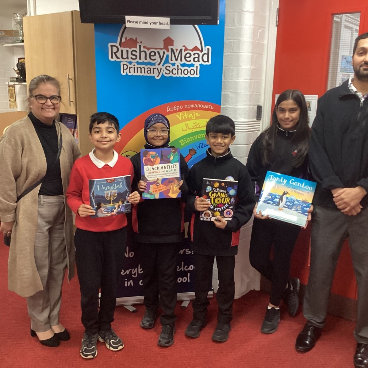 HMRC Book Donation - Rushey Mead Primary School